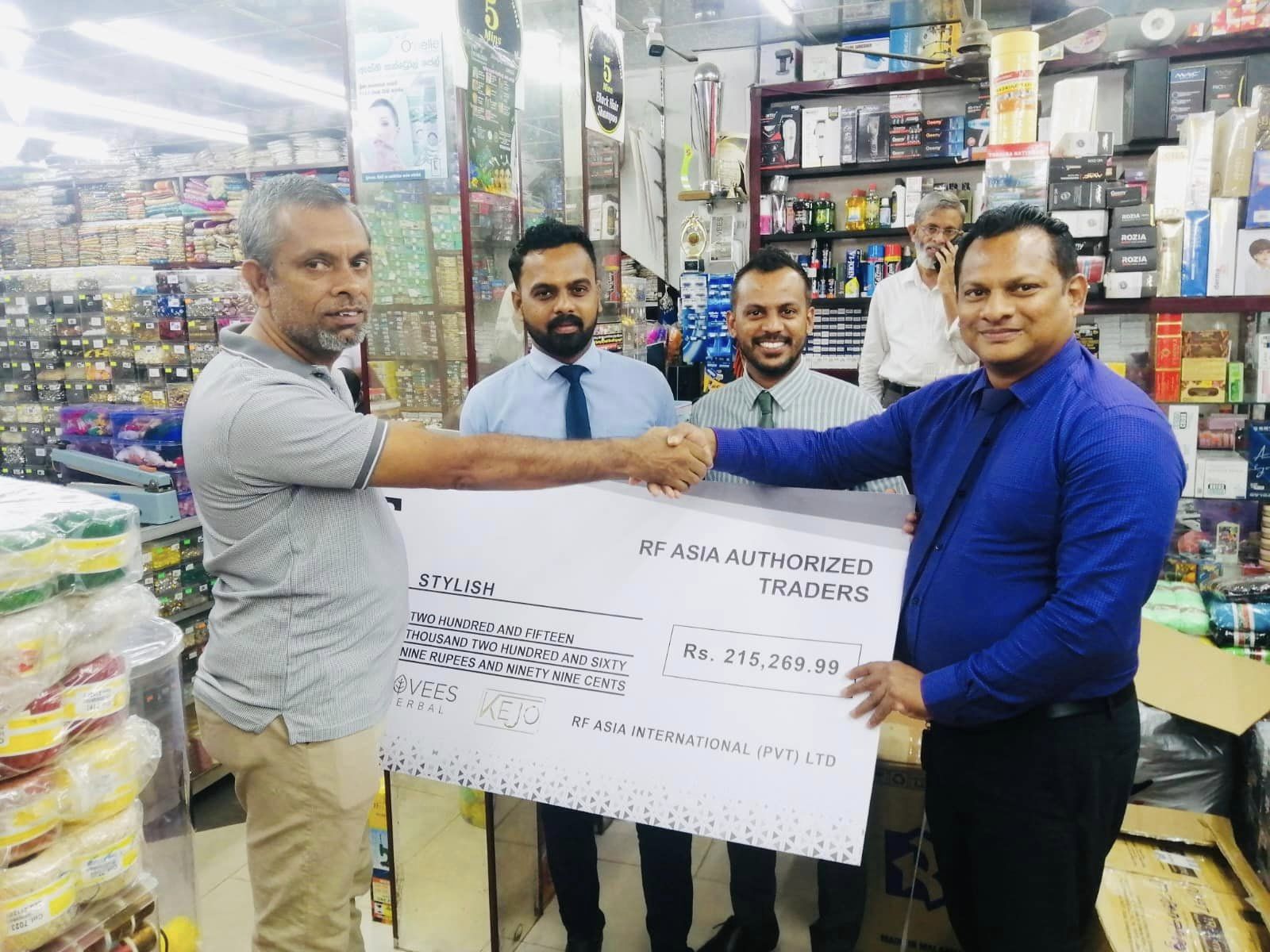 Distribution of cheques to the RF Asia International Authorized Traders ...